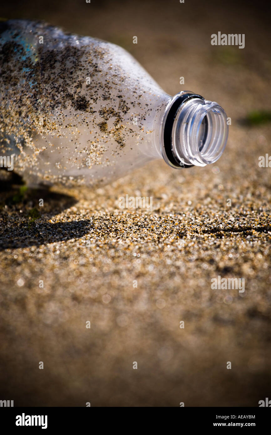 empty plastic bottle on the sand Stock Photo - Alamy