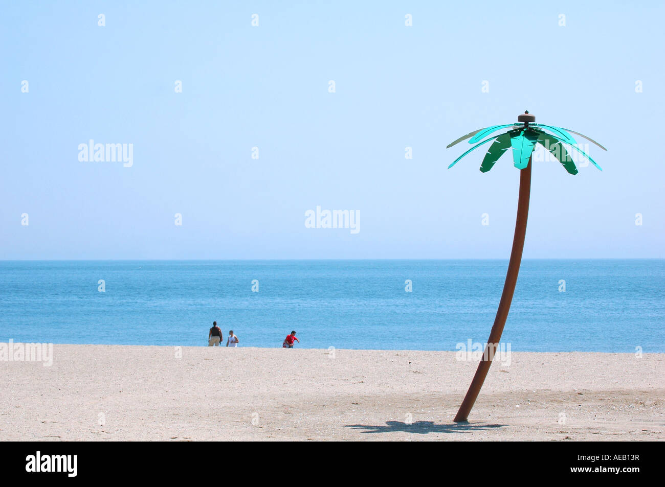 Artificial Palm Tree Water Sprinkler Stock Photo - Alamy