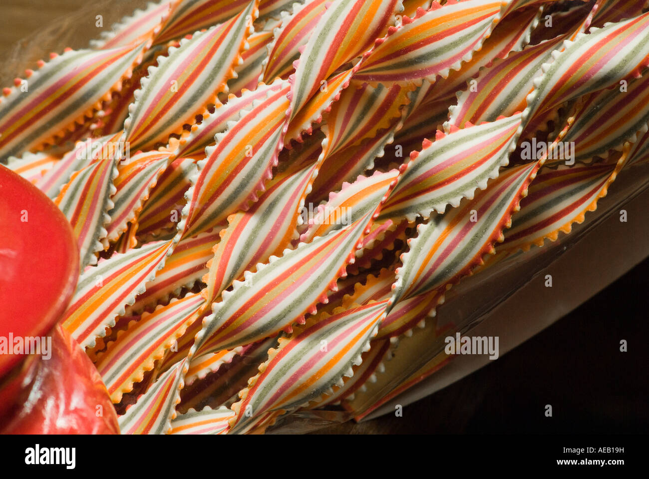 Colorful ribbon pasta in cellophane Stock Photo - Alamy