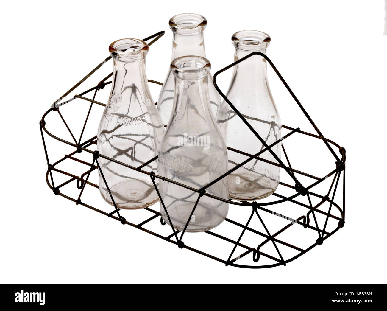 Milk Bottles in Wire Basket Stock Photo - Alamy