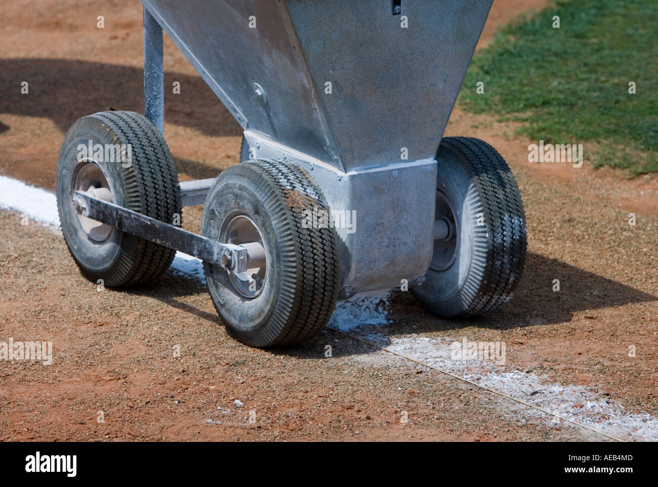 Machine making foul line at a baseball game Stock Photo - Alamy