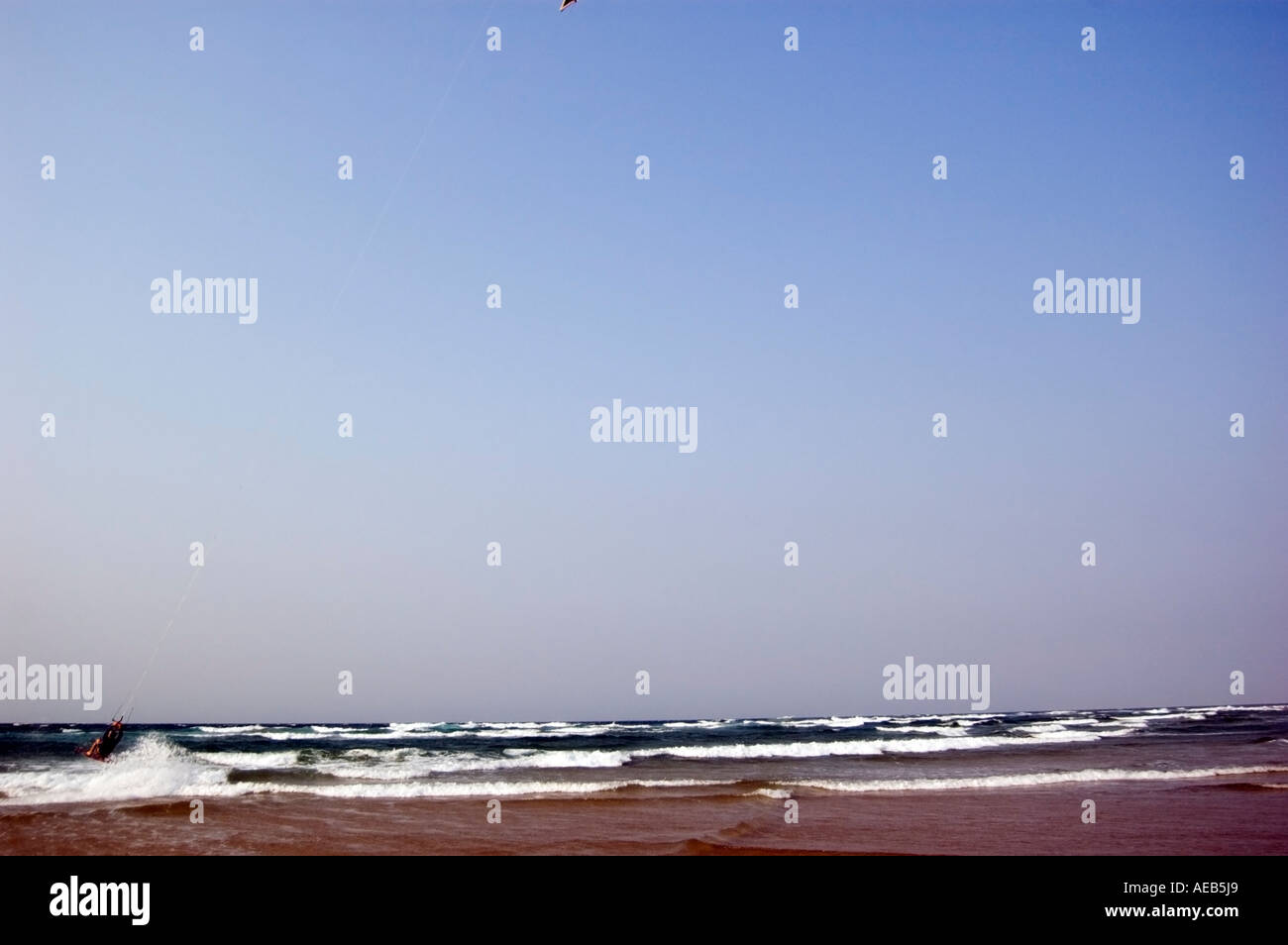 Parasurfing through the surf on the Zululand Coast at Sodwana Bay ...