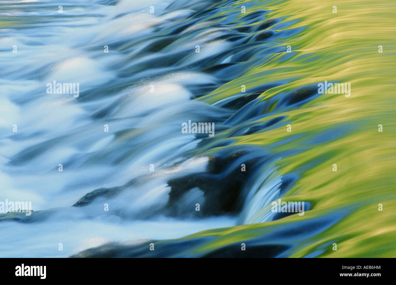 Water reflections in the River Rothay, Lake District, UK Stock Photo ...