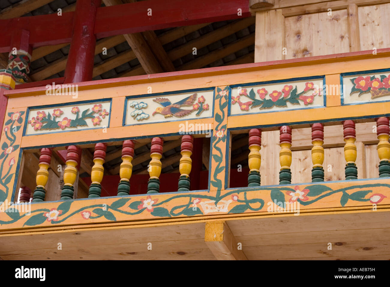 Ornate balustrades of a wooden house of the Baima people, in northern ...