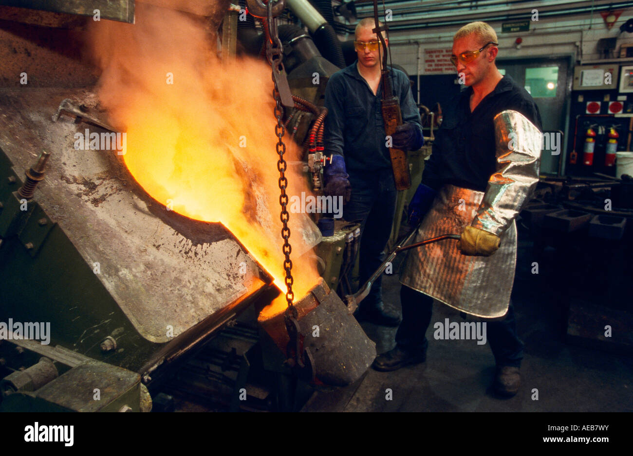Pouring gold into crucible for final purifying, Perth, Western ...