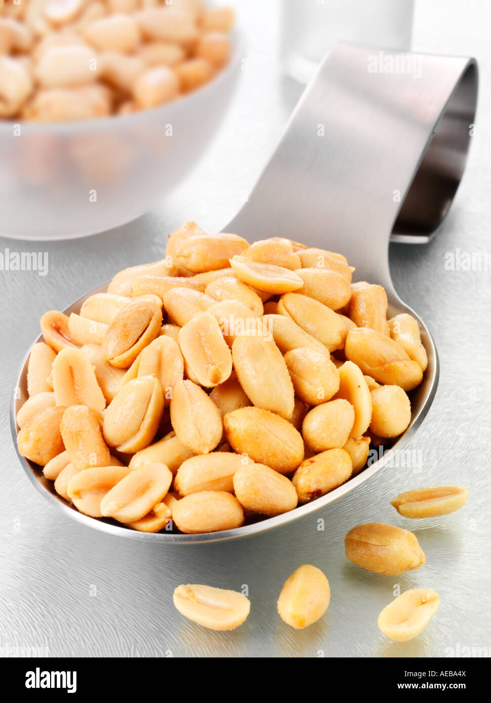 SPOONFUL OF ROASTED PEANUTS Stock Photo - Alamy