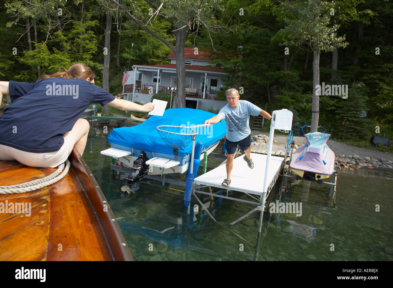 Delivering the mail by mailboat on Skaneateles Lake in the Finger Lakes ...