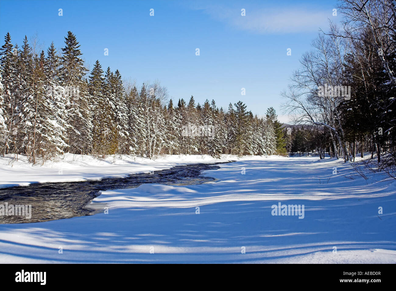 River Partially Frozen in Winter Stock Photo - Alamy