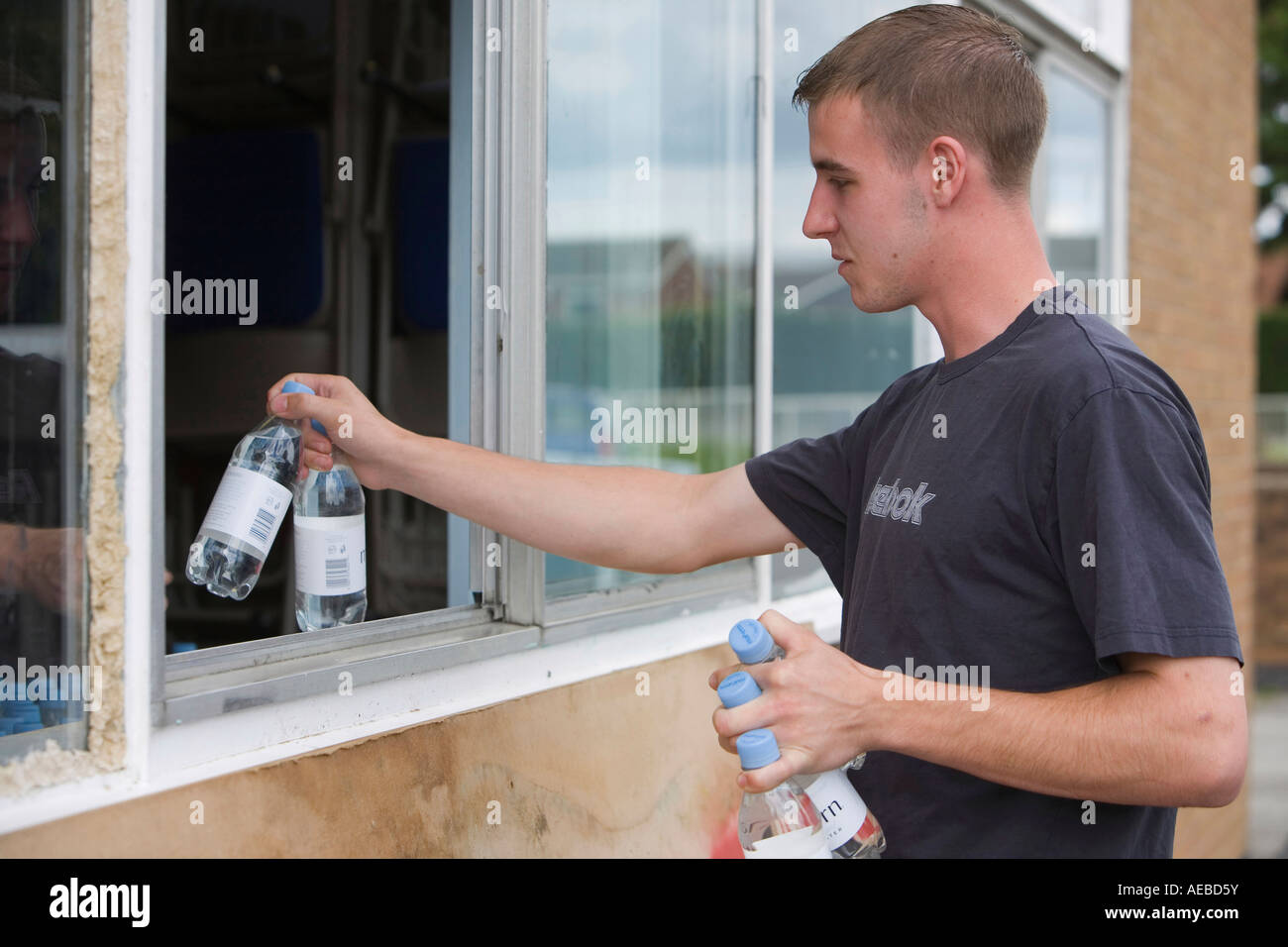Residents receiving drinking water in Tewkesbury Stock Photo - Alamy