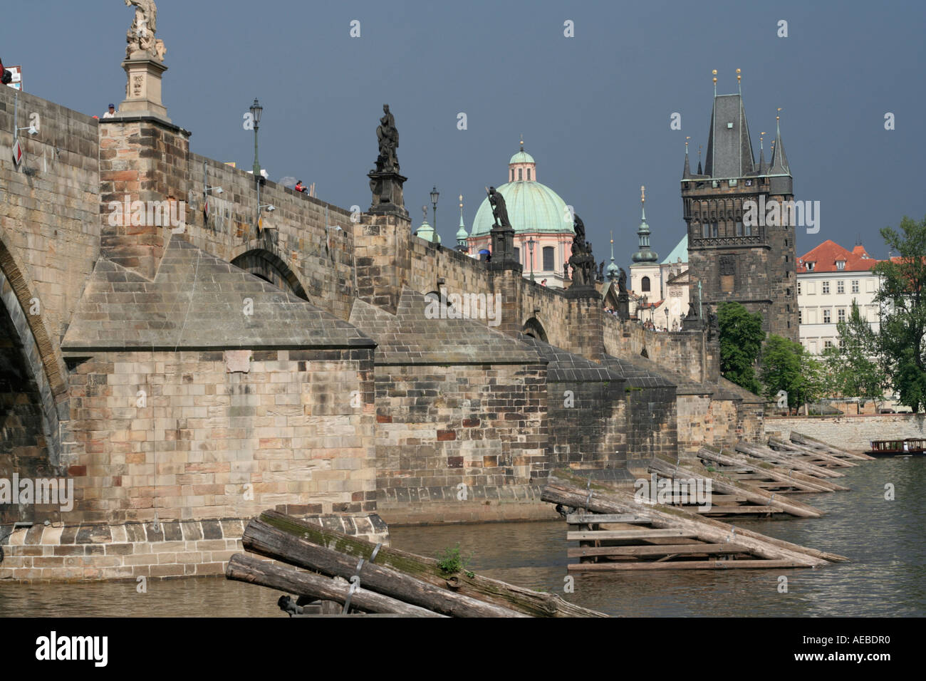 Charles Bridge is a famous historical bridge that crosses the Vltava ...