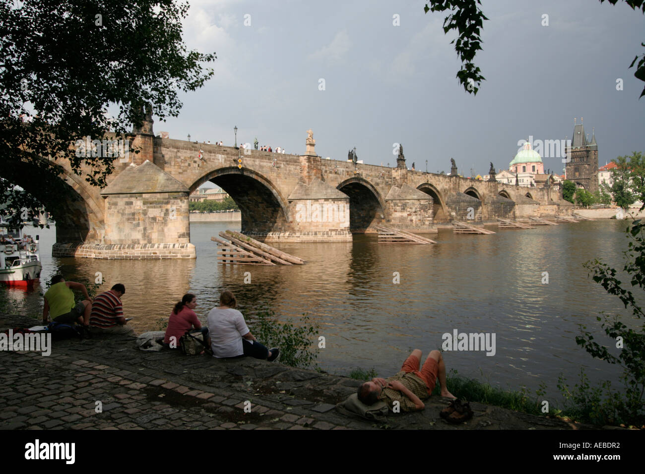 Charles bridge is a famous historical bridge that crosses hi-res stock ...