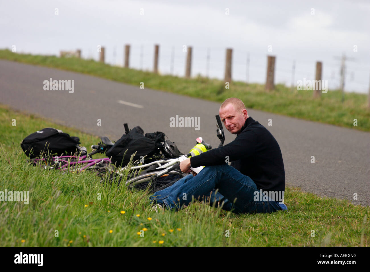 Bike rider having a rest Stock Photo - Alamy