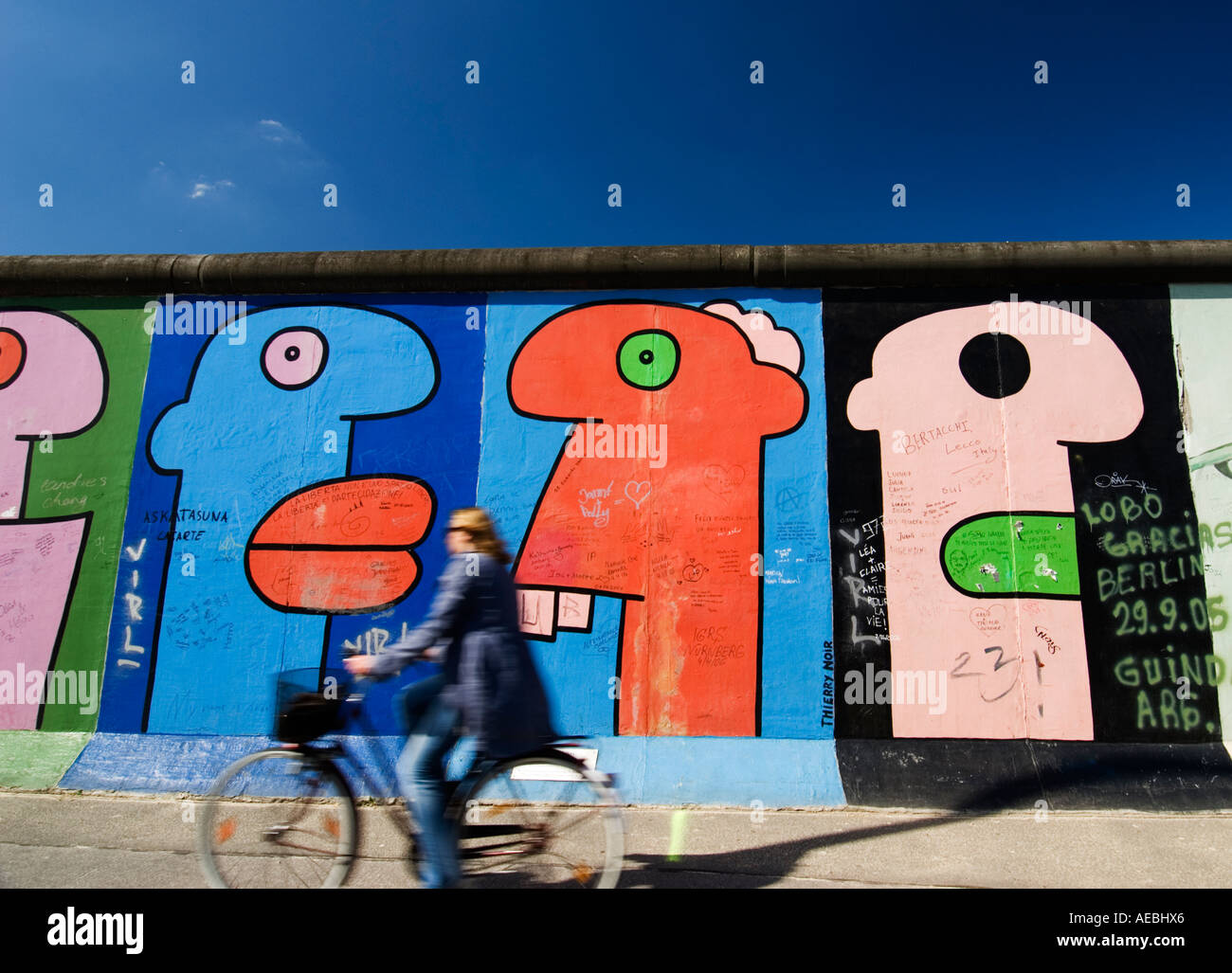 Colourful murals painted on Berlin Wall at East Side Gallery in Berlin ...