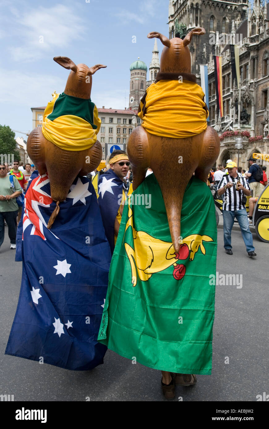Two Australian football supporters with flags and kangaroos in Munich ...