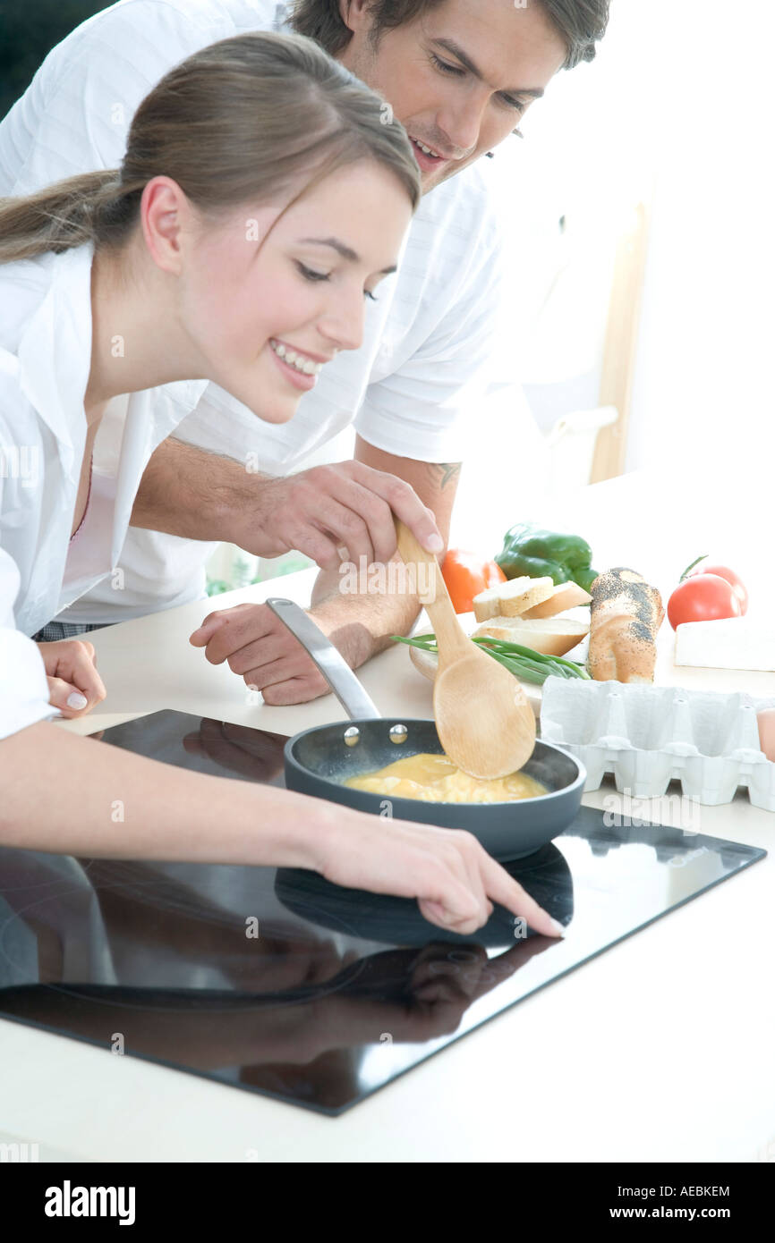 couple making breakfast Stock Photo - Alamy