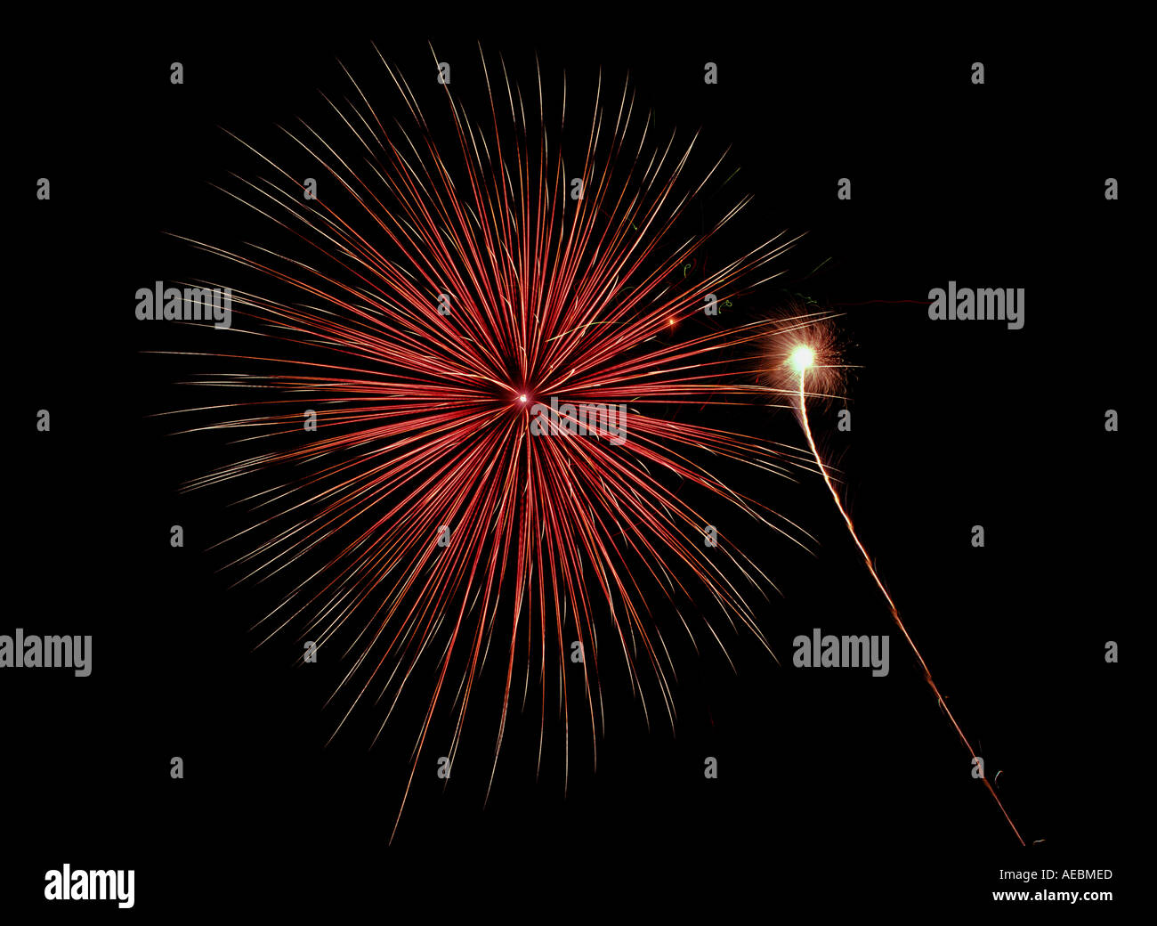 An aerial bomb burst during a fireworks display Stock Photo - Alamy