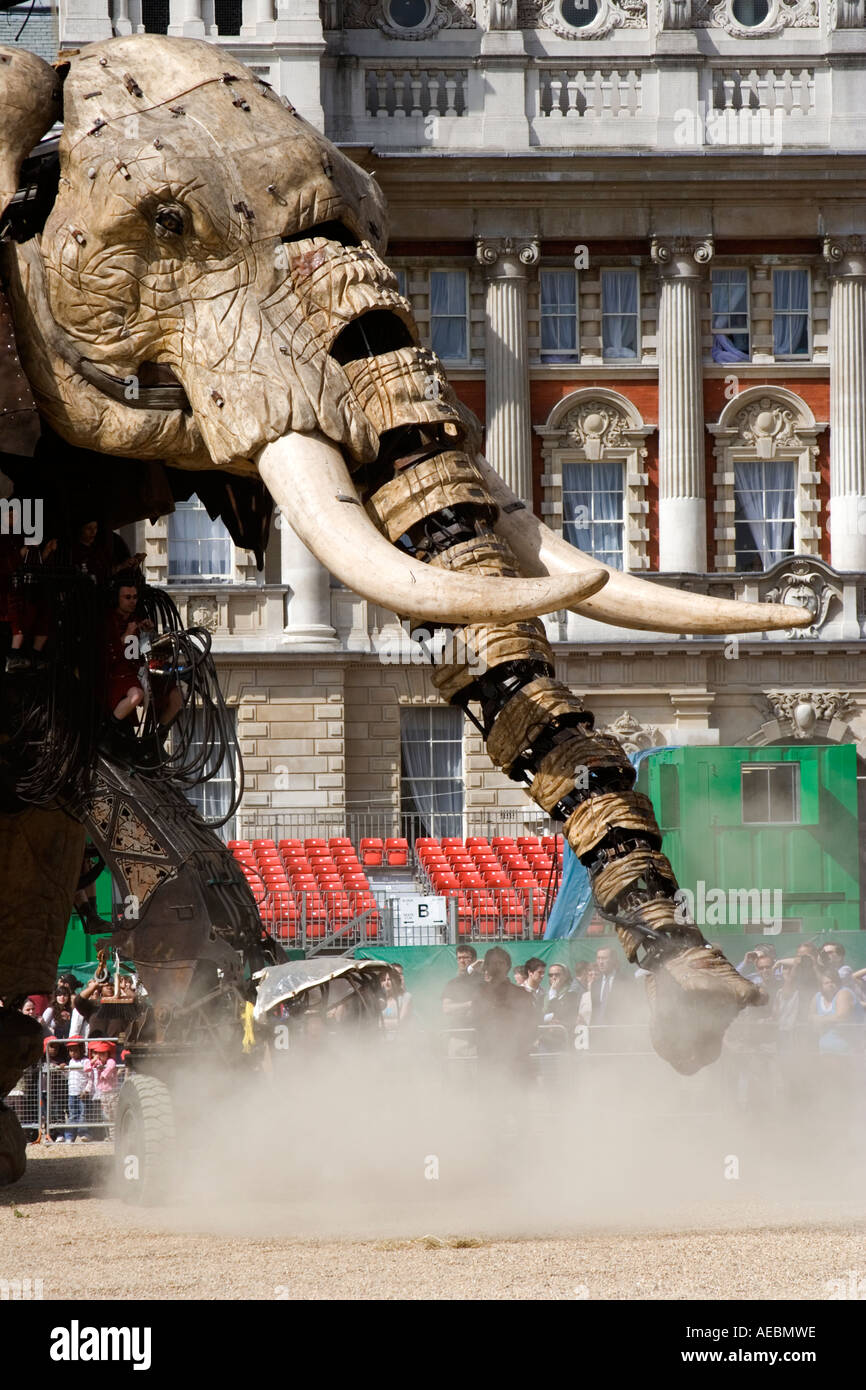 The Sultan's Elephant blowing dust with its trunk, London, England ...