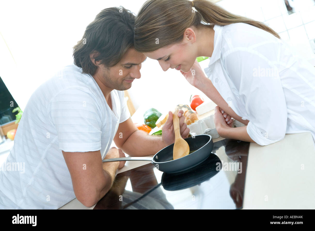 couple making breakfast Stock Photo - Alamy
