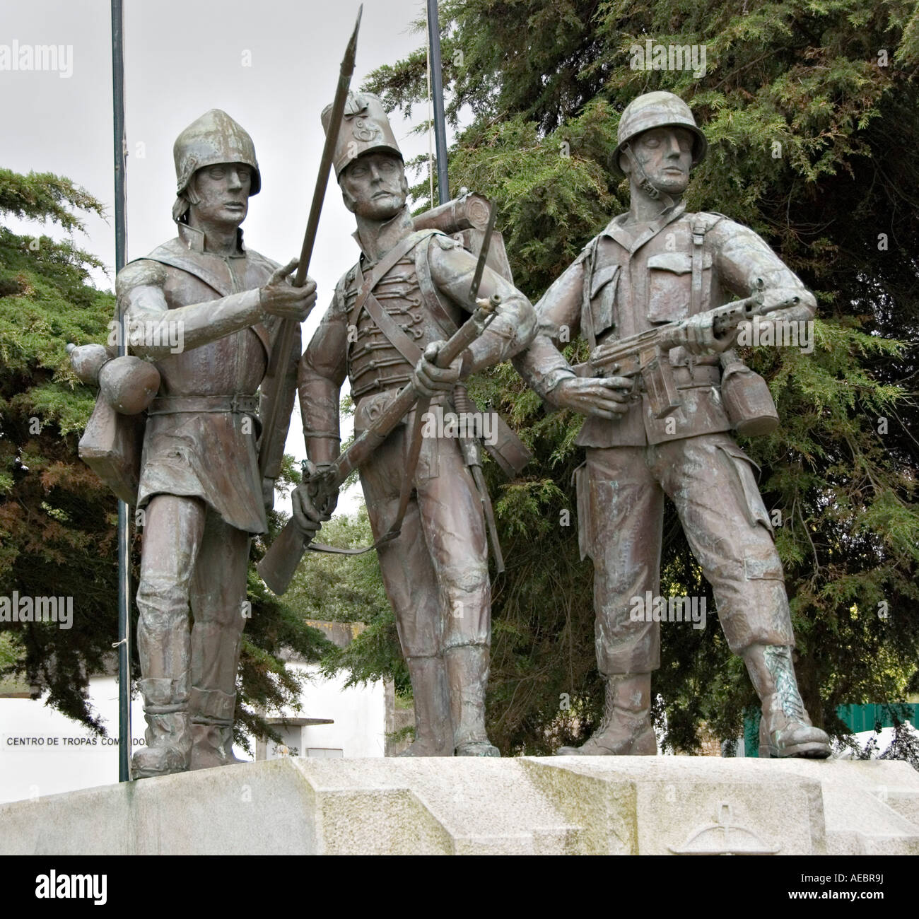 A war memorial in Mafra, Portugal, showing the uniforms of 3 military ...