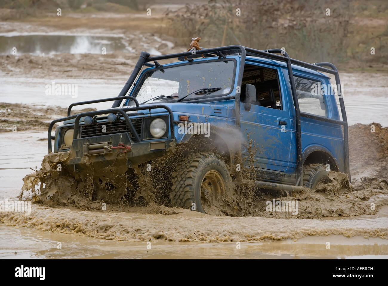 Driver competing in an off road 4x4 competition Stock Photo - Alamy