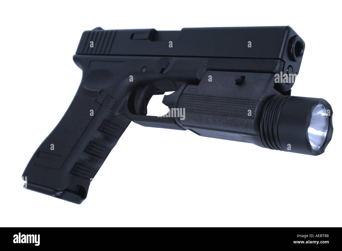 cut out of a glock 17 gun with torch attached Stock Photo - Alamy