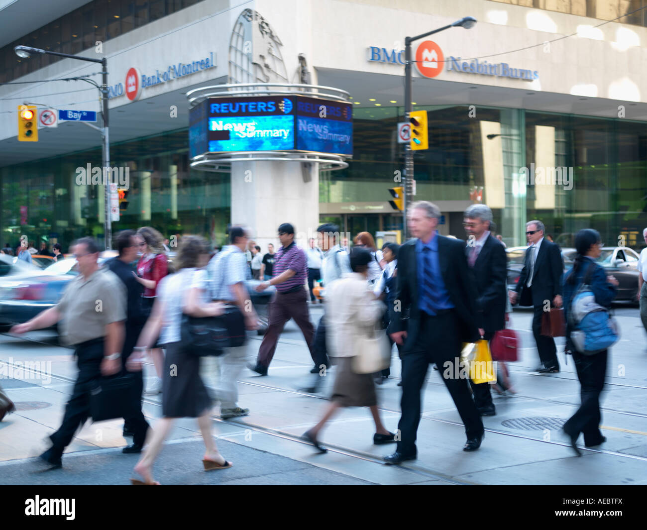 Canada Ontario Toronto pedestrians crossing street in the financial ...
