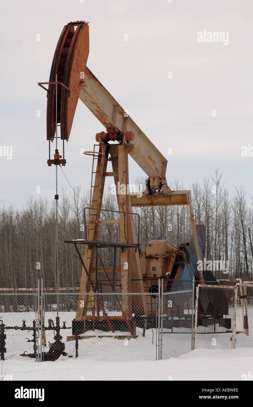 Oil Well in Field of Snow in Alberta Canada Stock Photo - Alamy