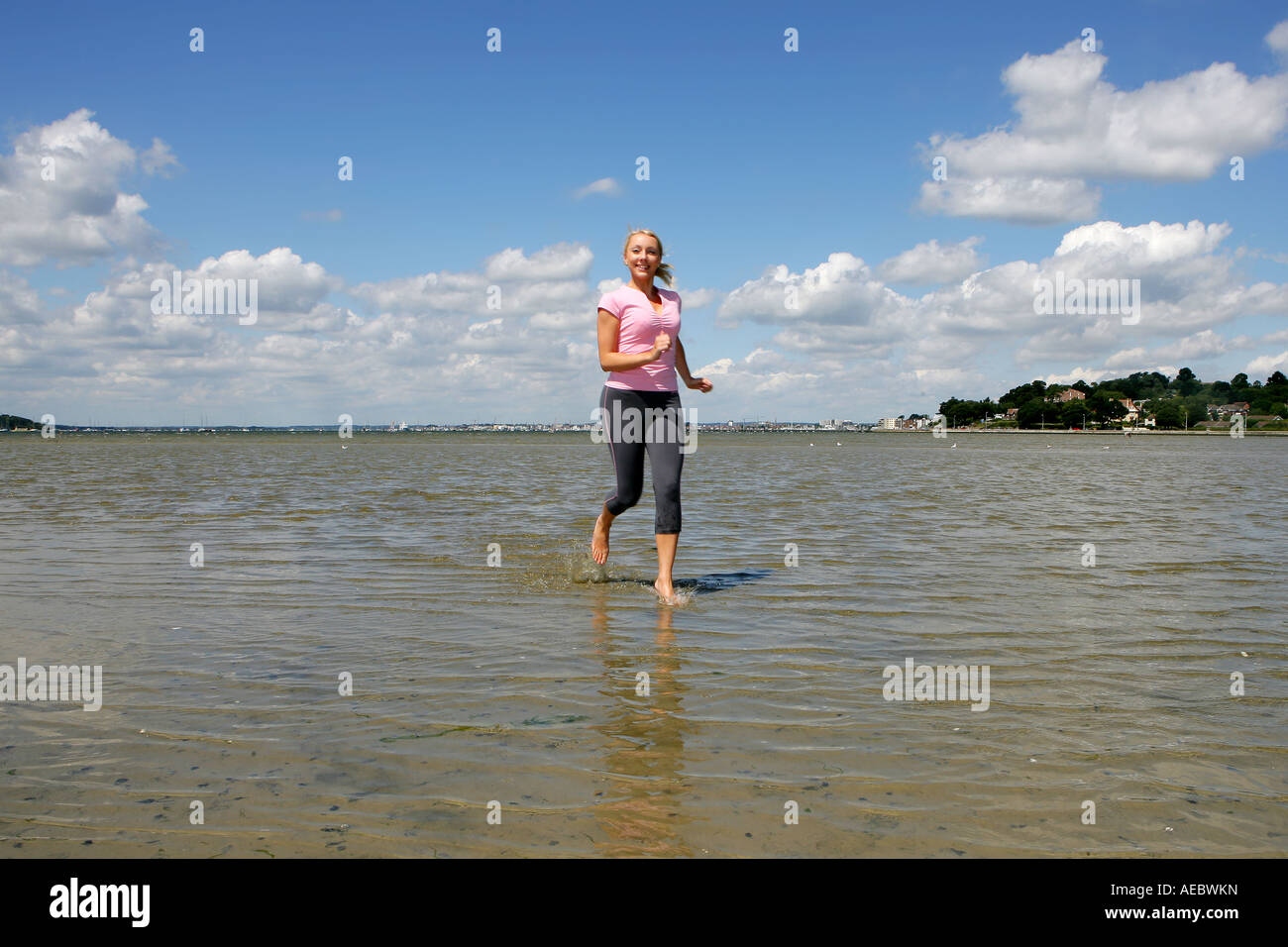 Young Woman Running Model Released Stock Photo - Alamy