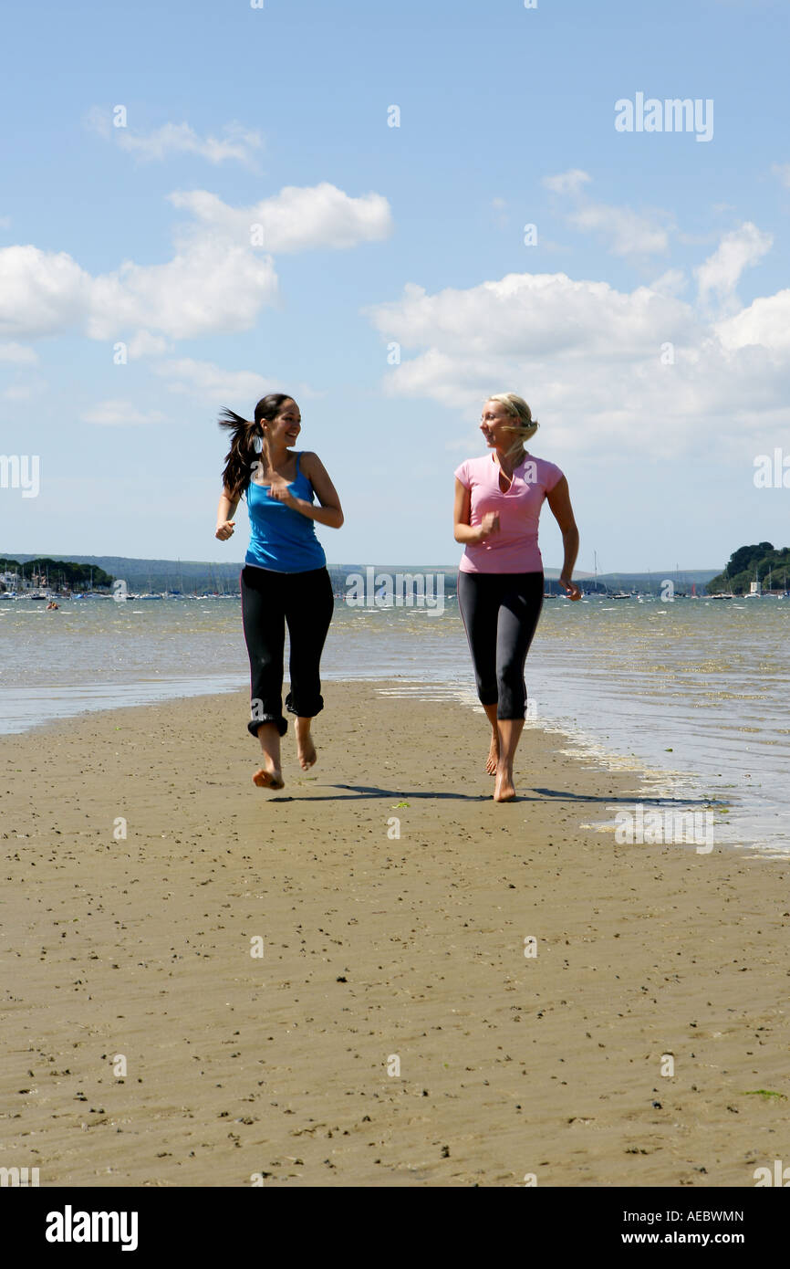 Young Women Running Model Released Stock Photo - Alamy