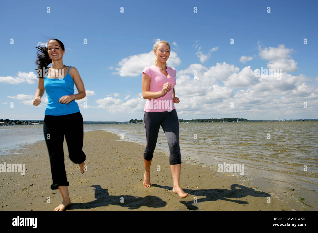 Young Women Running Model Released Stock Photo - Alamy