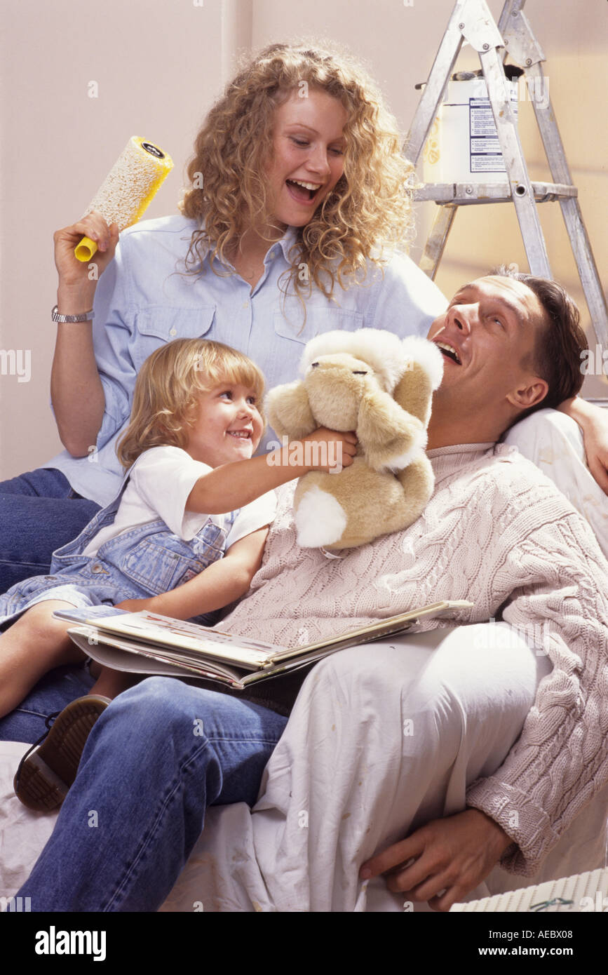Family at home Stock Photo - Alamy