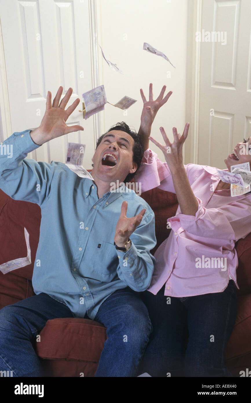 Man throwing money notes hi-res stock photography and images - Alamy