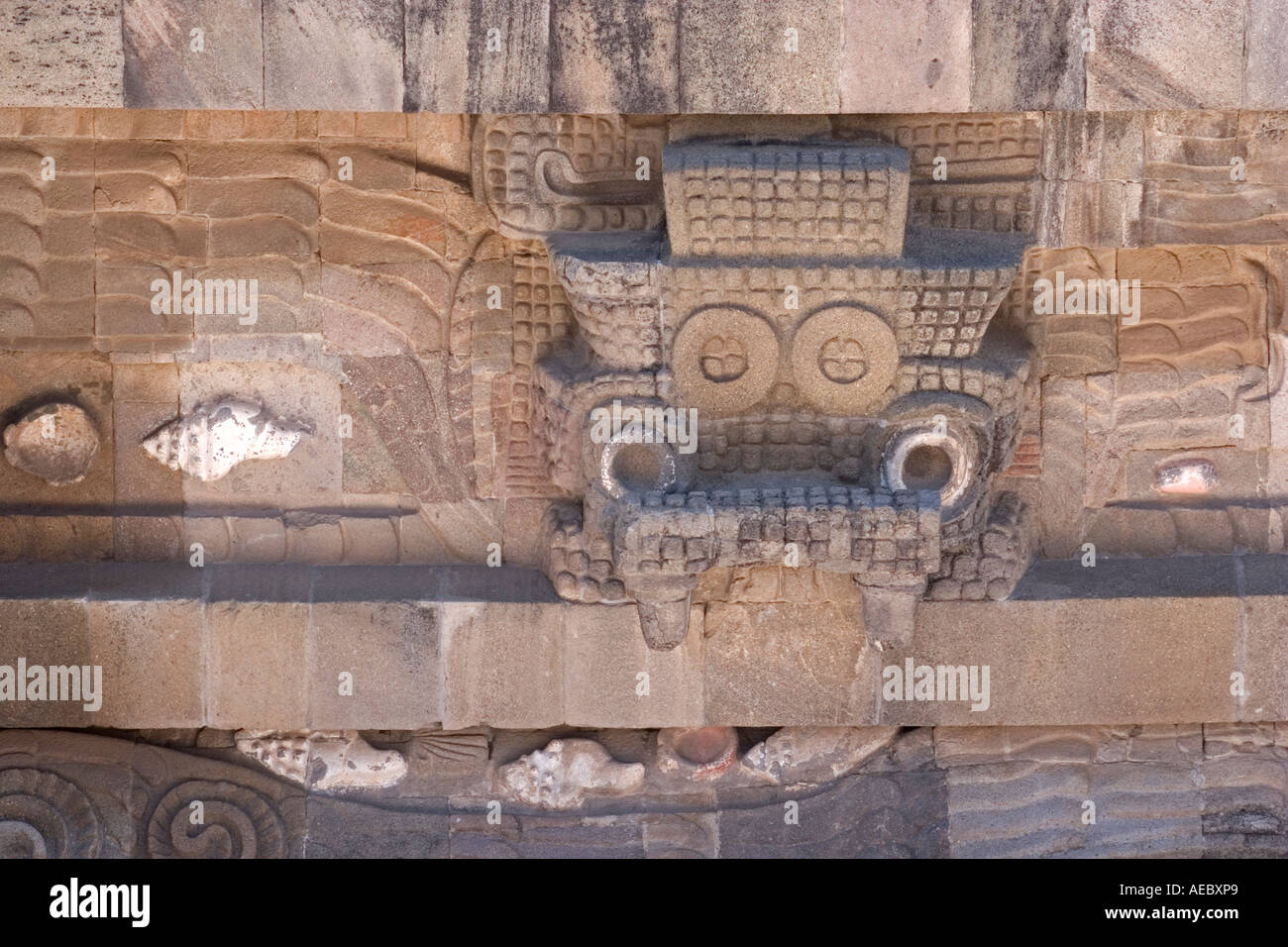 Feathered snake pyramid: close-up on the God Tlaloc (Mexico). Pyramide ...