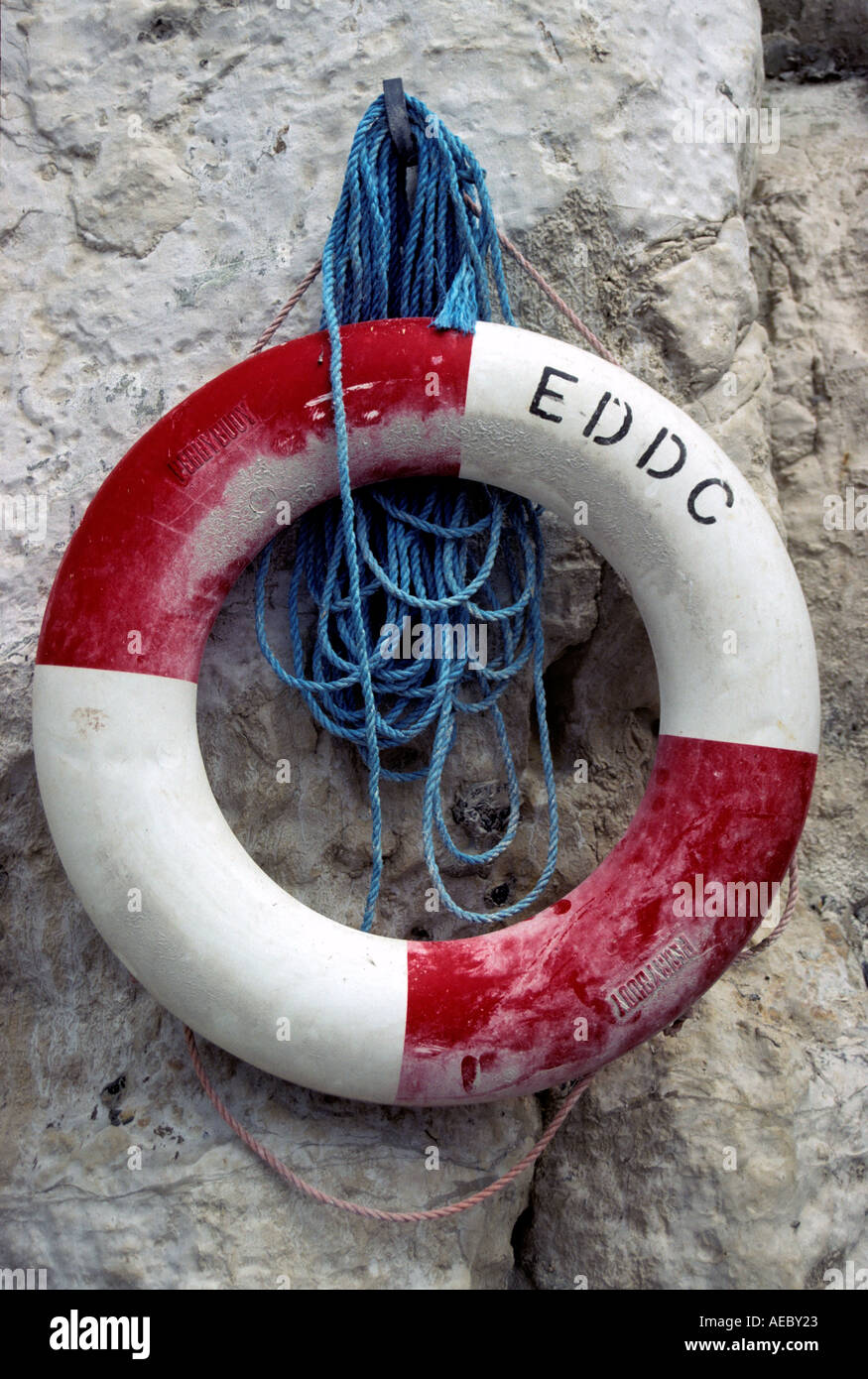 East Devon White and red coloured sea life ring with blue rope Stock ...
