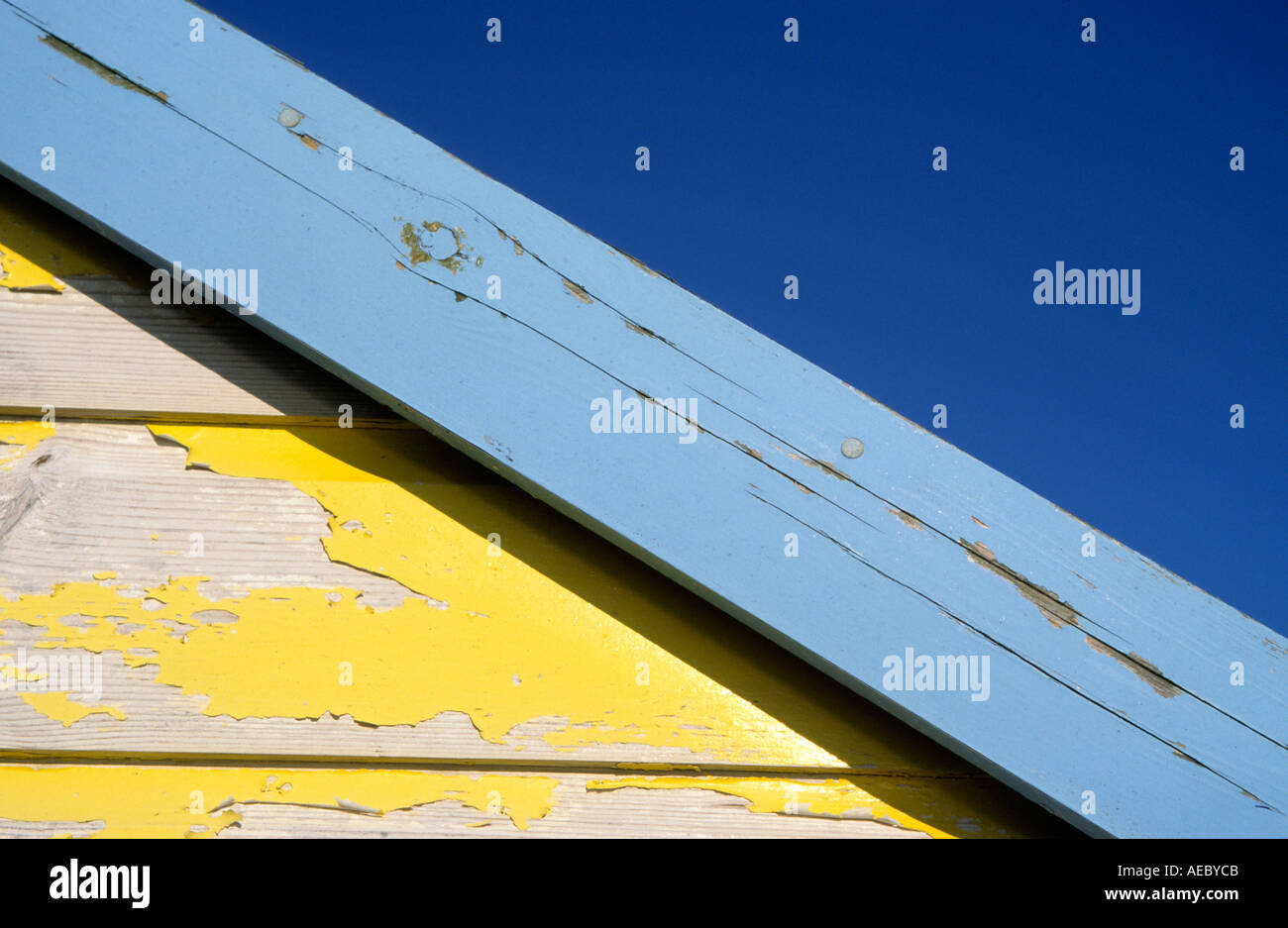 Colourful blue yellow beach huts Stock Photo - Alamy