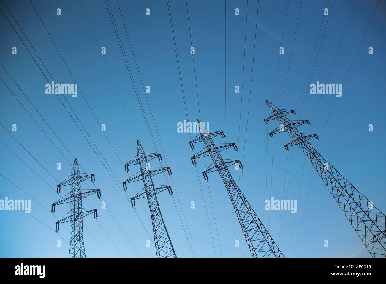 Electricity pylons powerline power transmission Stock Photo - Alamy