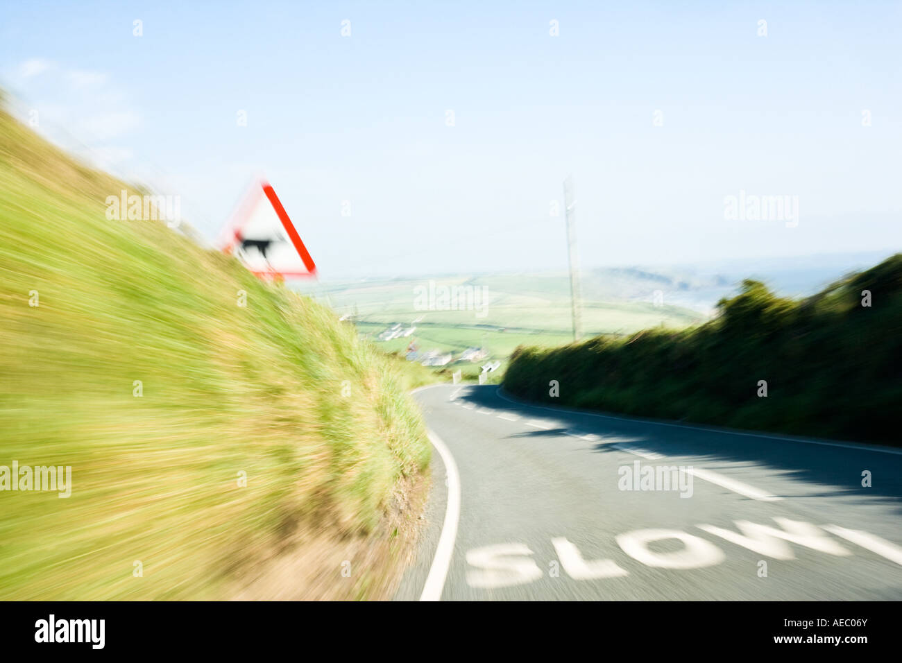 'Slow' sign on the road from Solva into Newgale in Pembrokeshire Wales ...