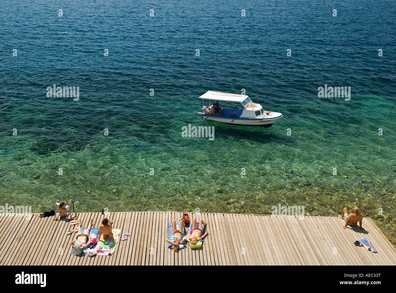 Tourist sunbathing in Foca, Izmir Turkey Stock Photo - Alamy