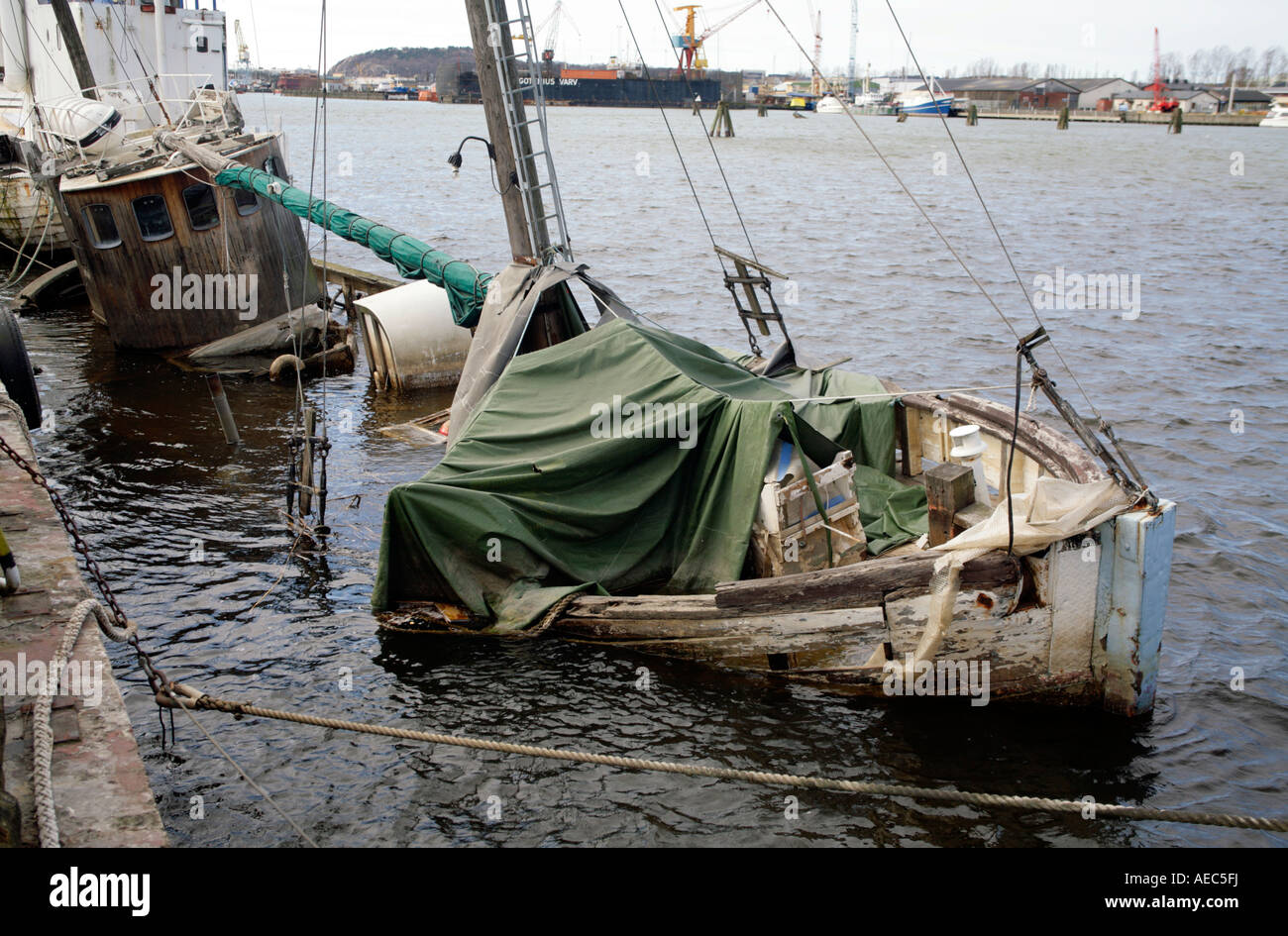 Neglected wooden boat sunken after storm at Gullbergskajen Gothenburg ...