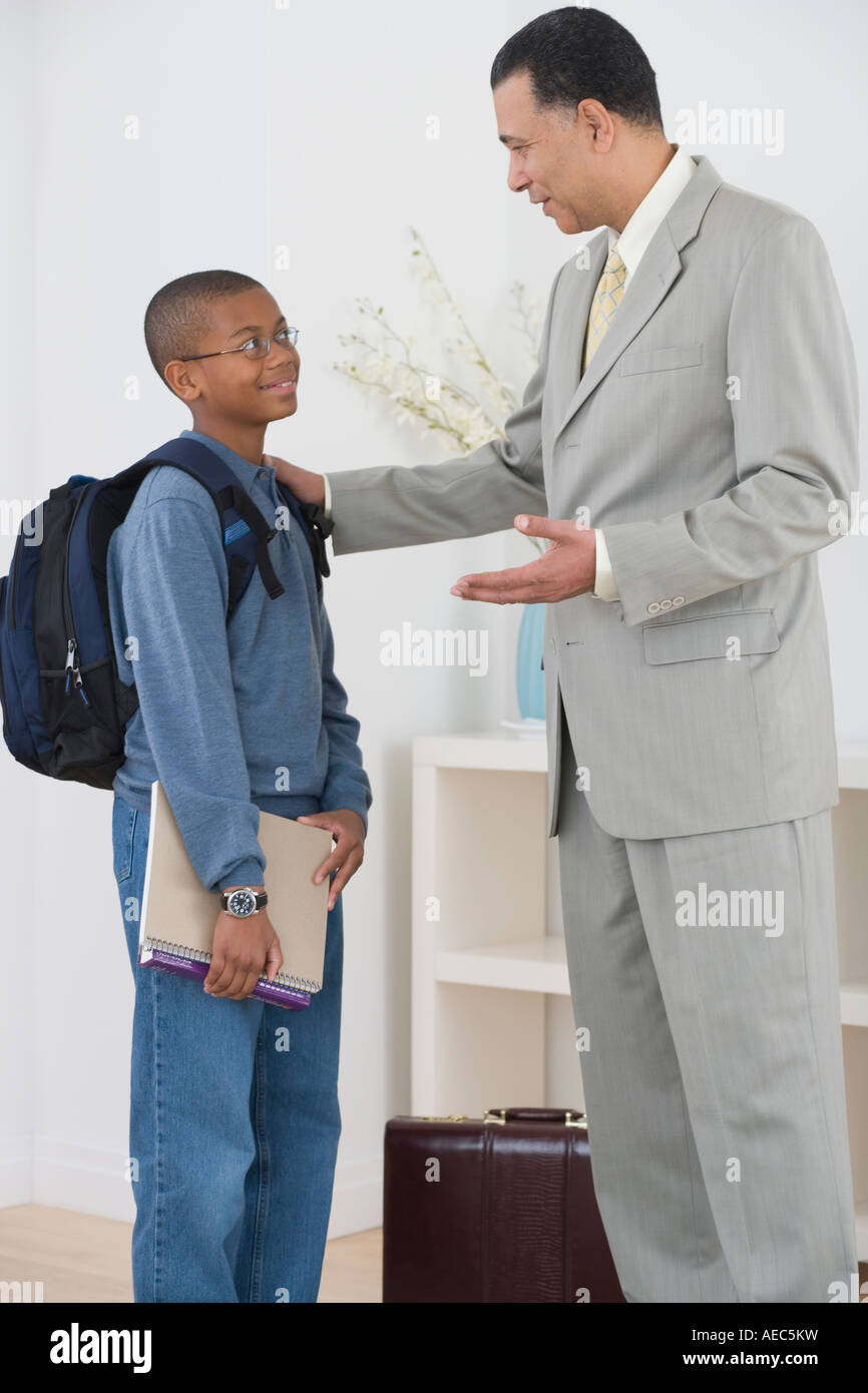 African father seeing son off to school Stock Photo - Alamy