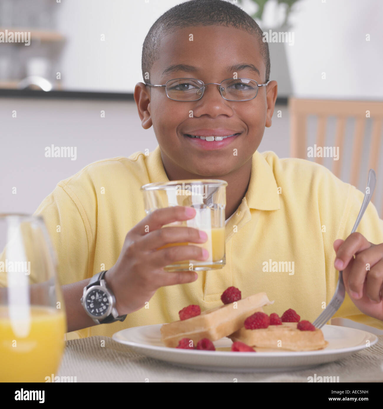 African boy eating breakfast Stock Photo - Alamy