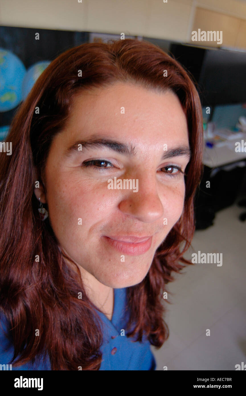 Woman at the office. Side view. Full face Stock Photo - Alamy