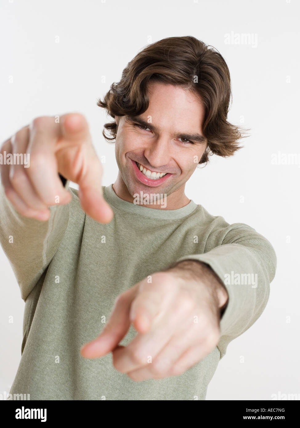 Hispanic man pointing Stock Photo - Alamy