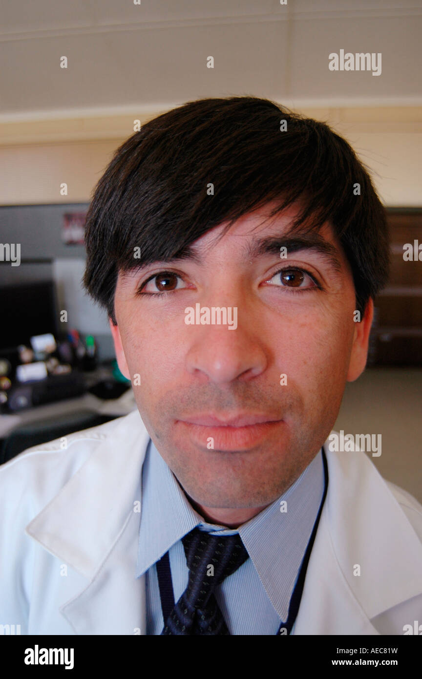 Man wearing doctor's rope looking at the camera Stock Photo - Alamy