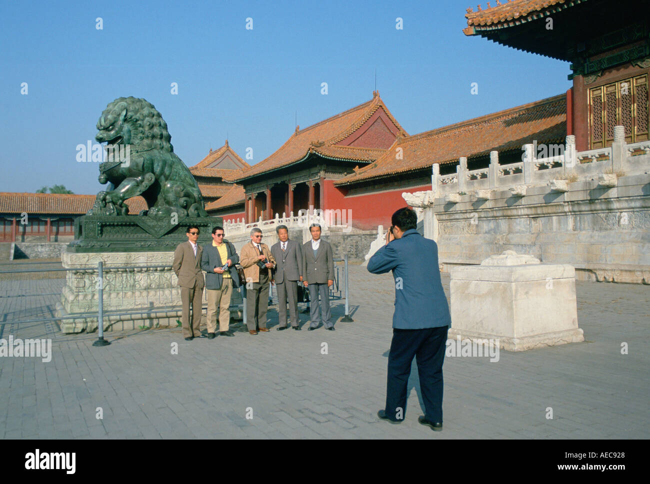 Tourists pose for photographs in Forbidden City Beijing China Stock ...