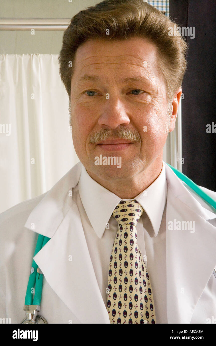 Doctor in exam room Stock Photo - Alamy