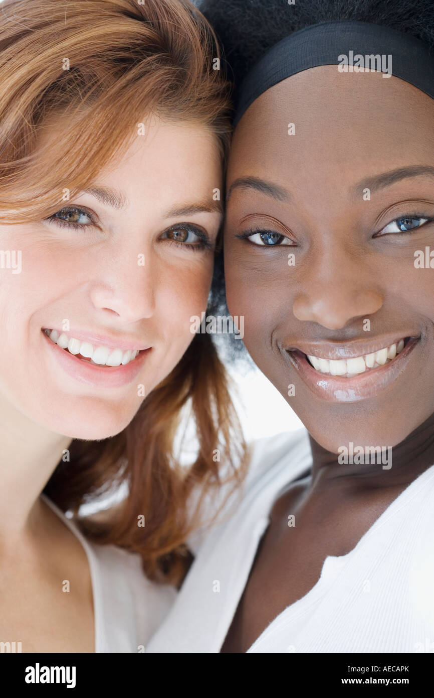 Close up of two women smiling Stock Photo - Alamy