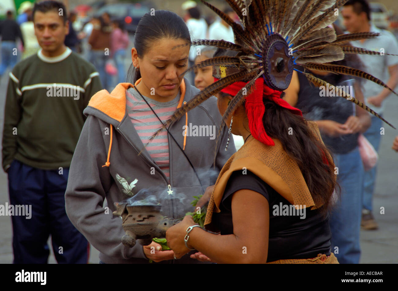 A Conchero dancer invoking a spiritual blessing in the Zocalo of Mexico ...