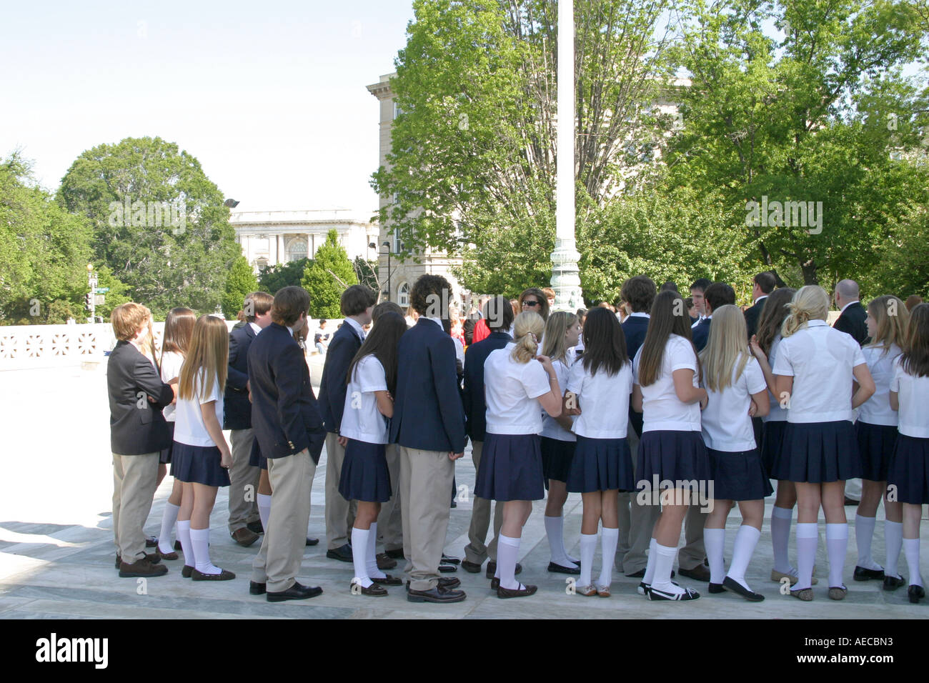 school kids in uniform on school trip Stock Photo - Alamy