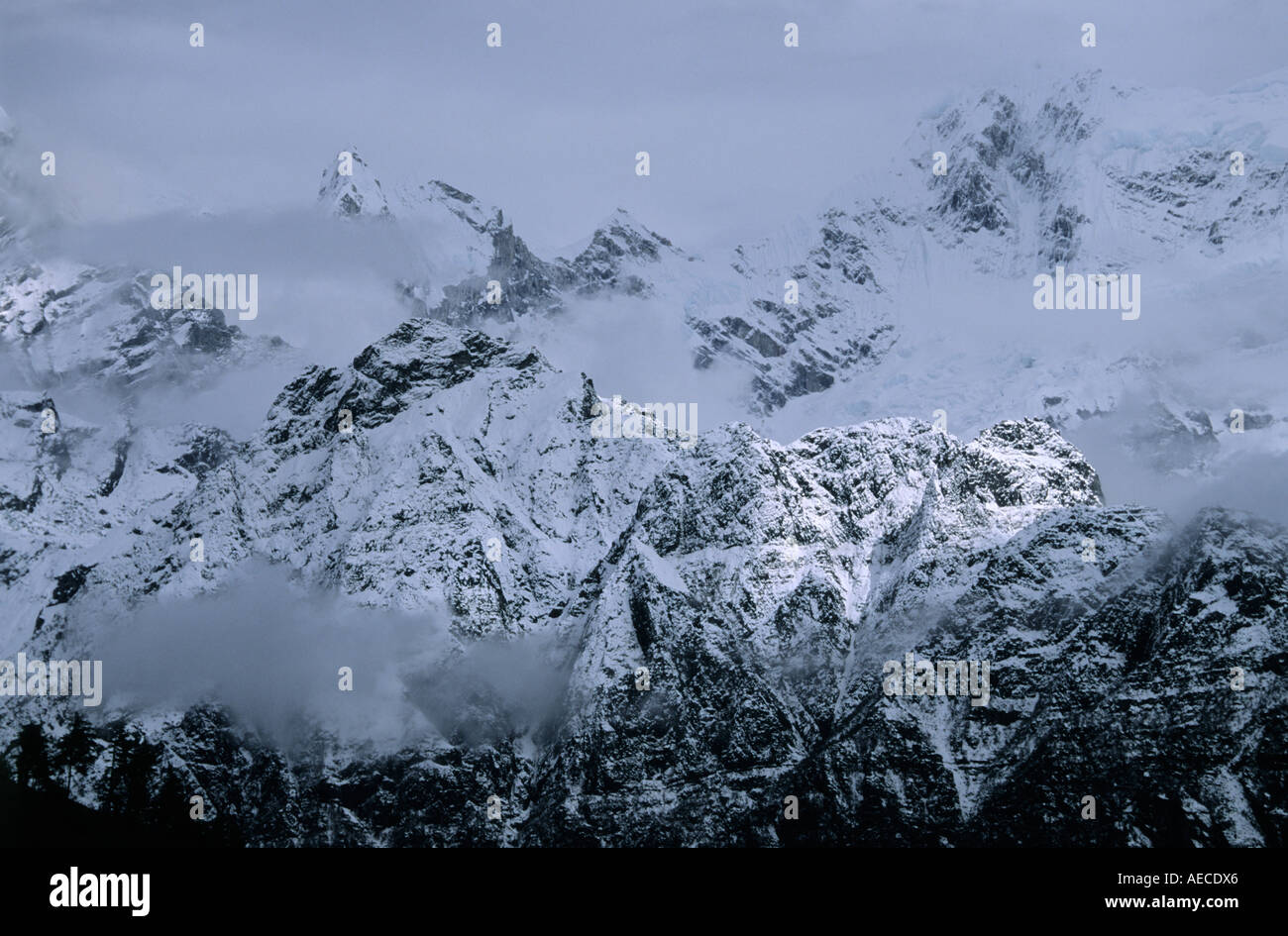 Cloudy Manaslu Himal range as seen from Danaque Annapurna Conservation ...